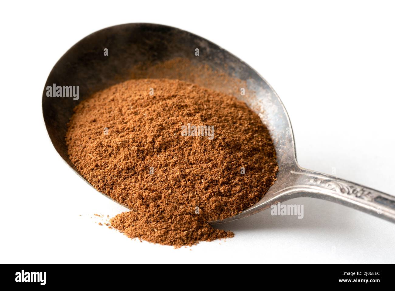 Ground Cinnamon Spilled from a Vintage Spoon Stock Photo - Alamy