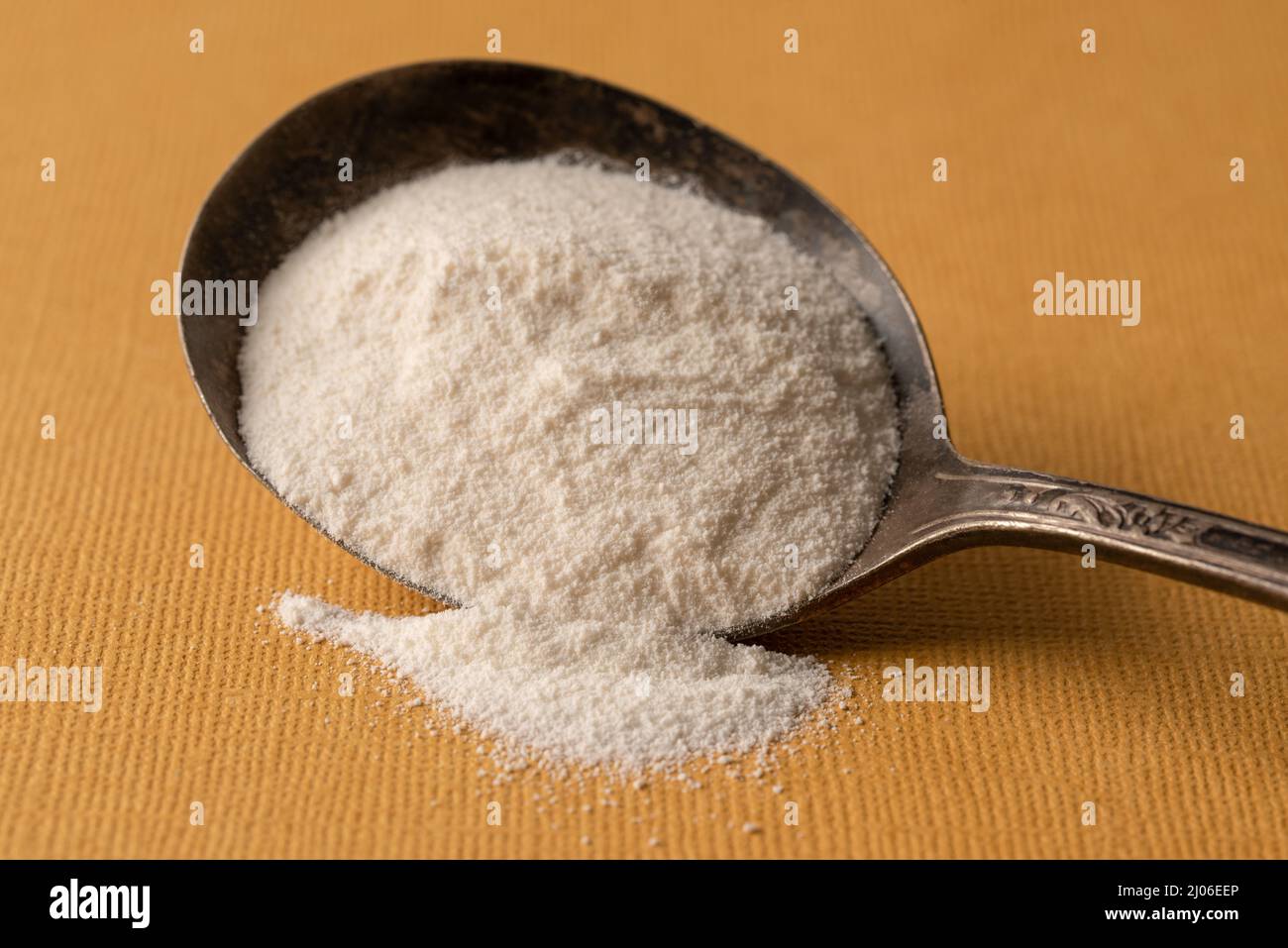 Powdered Creamer Spilled from a Vintage Spoon Stock Photo - Alamy