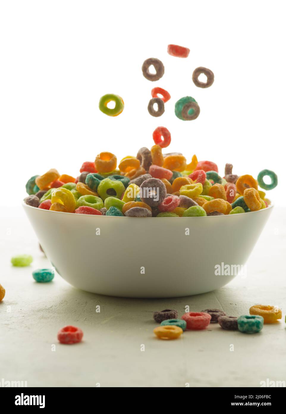 In a white bowl, cereal corn multi-colored rings, rings in a frozen ...