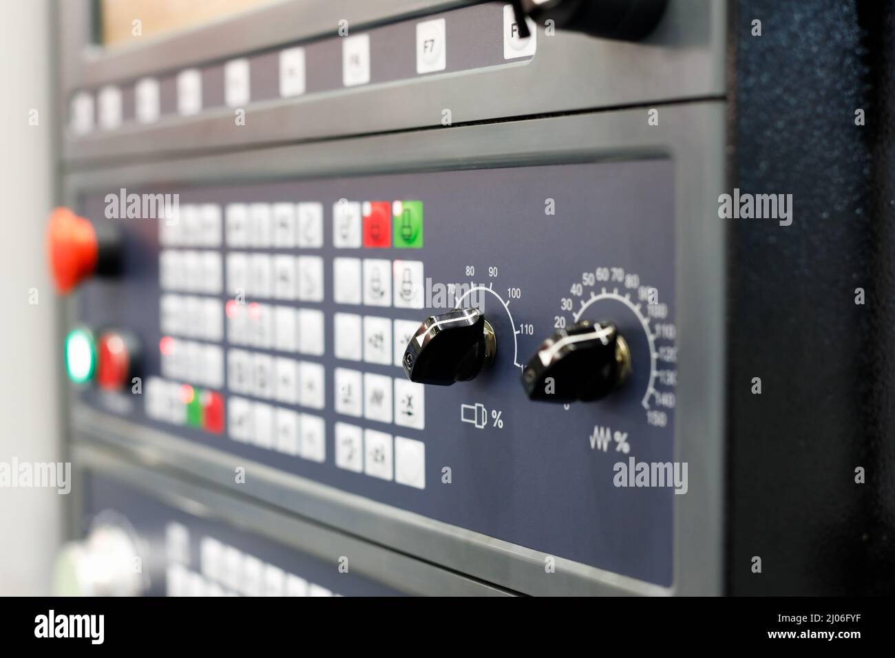 Keys and switches on a CNC control panel. Selective focus Stock Photo - Alamy