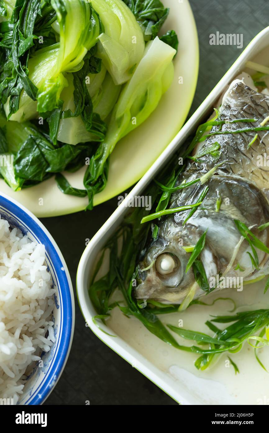 top view fast food of steamed fish and vegetable and rice at vertical ...