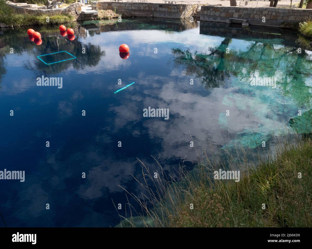 Blue Hole in Santa Rosa, New Mexico, with five red dive buoys floating ...