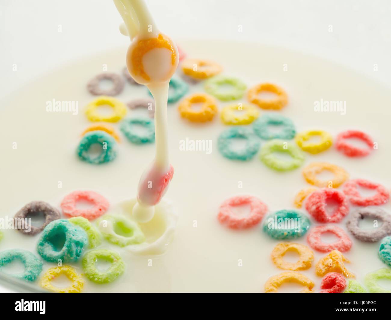 Cereal multi-colored fruit rings filled with milk - a quick cereal ...