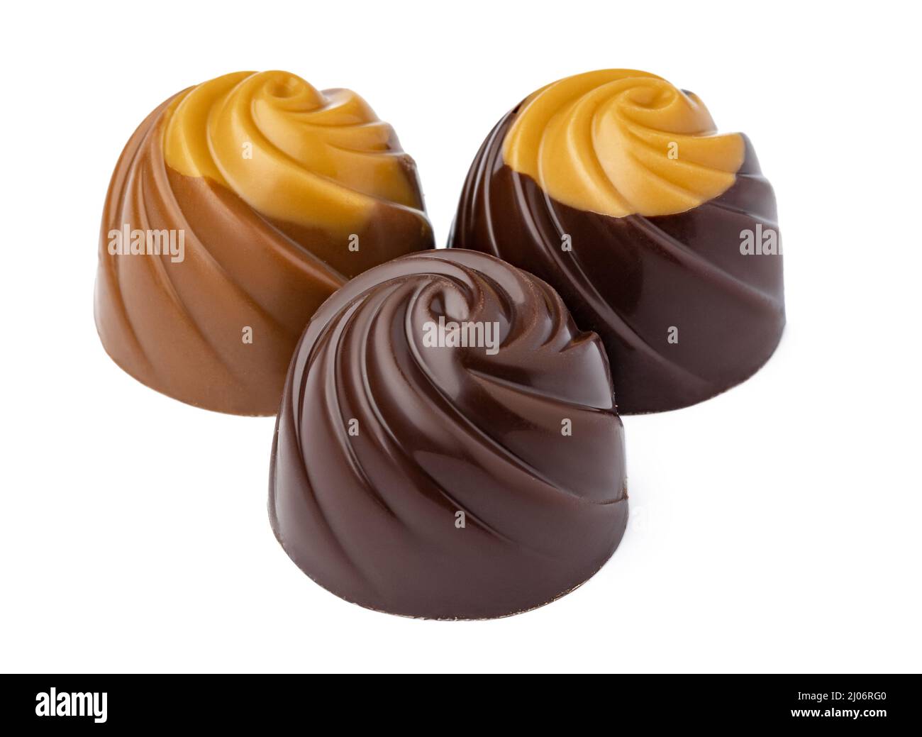 Chocolate sweets on a white background Stock Photo - Alamy