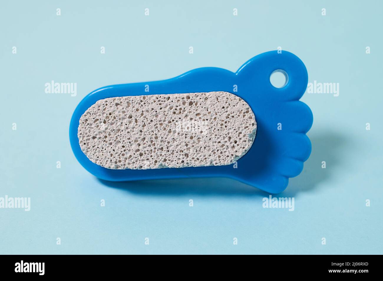 Pedicure kit. Pumice stone on a blue background Stock Photo - Alamy