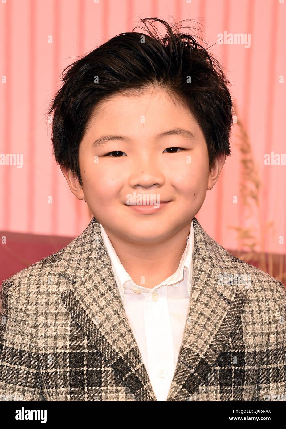 Alan Kim on the red carpet at Apple's "Pachinko" Global Premiere Event held at The Academy ...