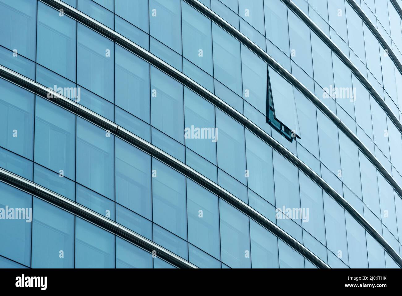 Close-up with the facade from a modern glass building. Office building ...
