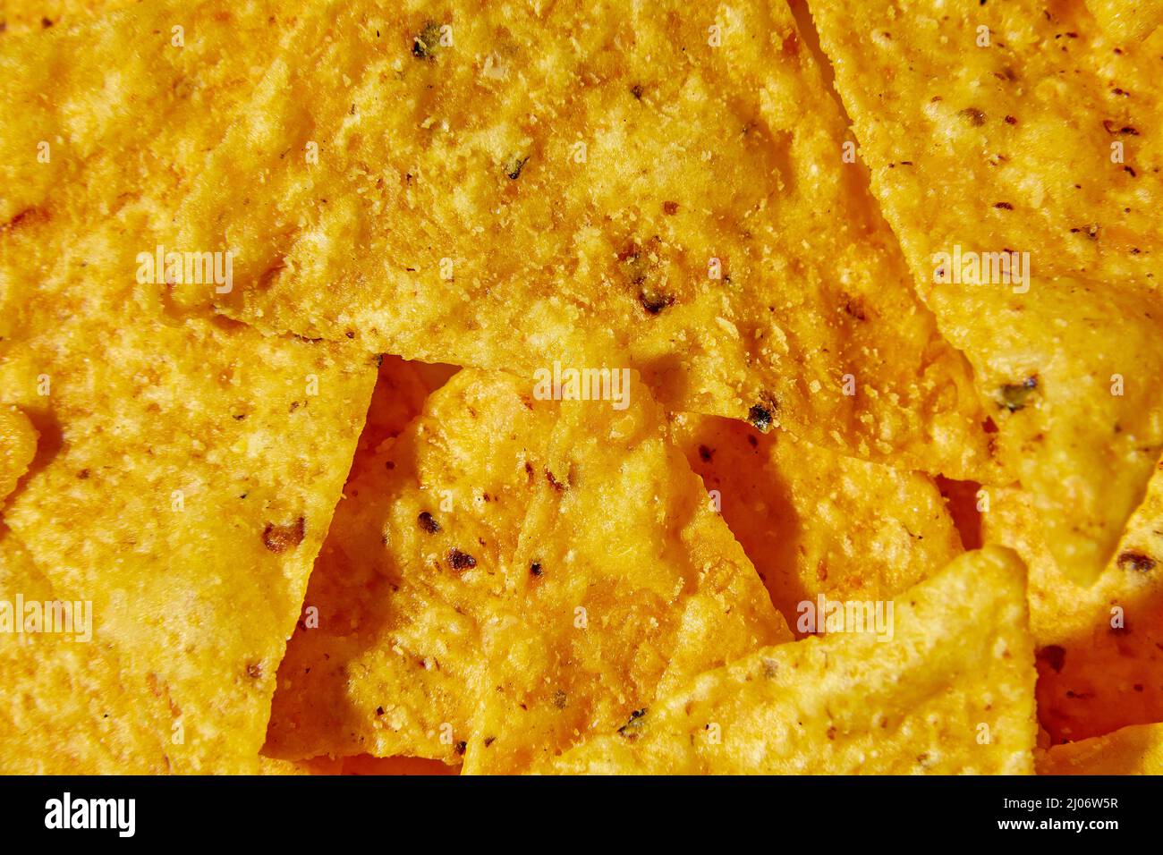 Flat lay macro nacho chips, Background of Corn Tortilla Chips or Nachos ...