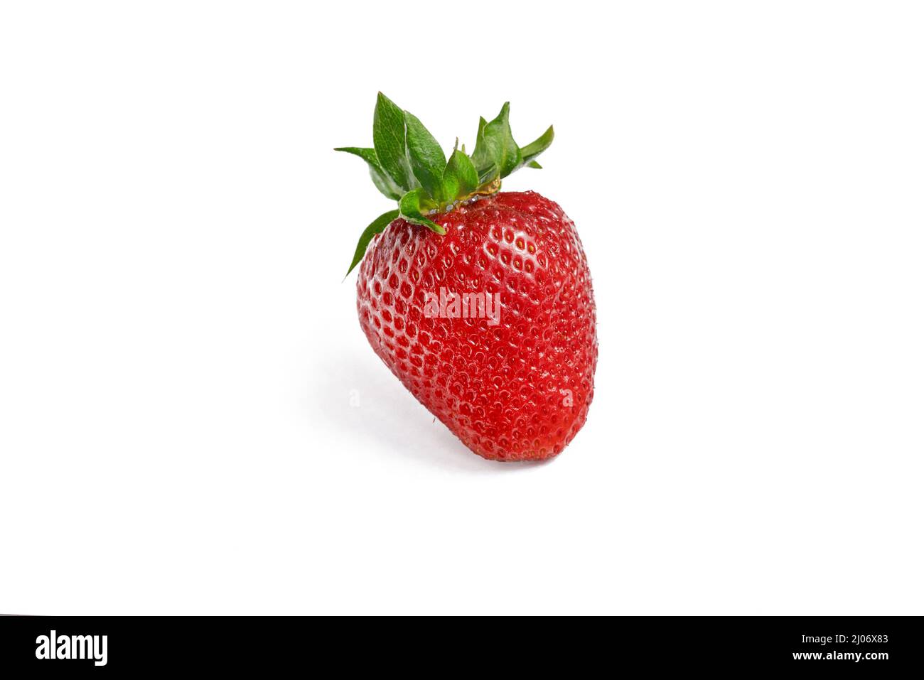 Strawberries isolated. Whole strawberries with leaves on a white ...