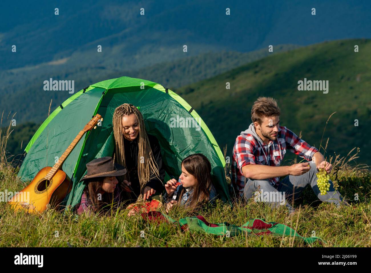 Young people on camping trip. Healthy lifestyle and eco tourism. Group ...