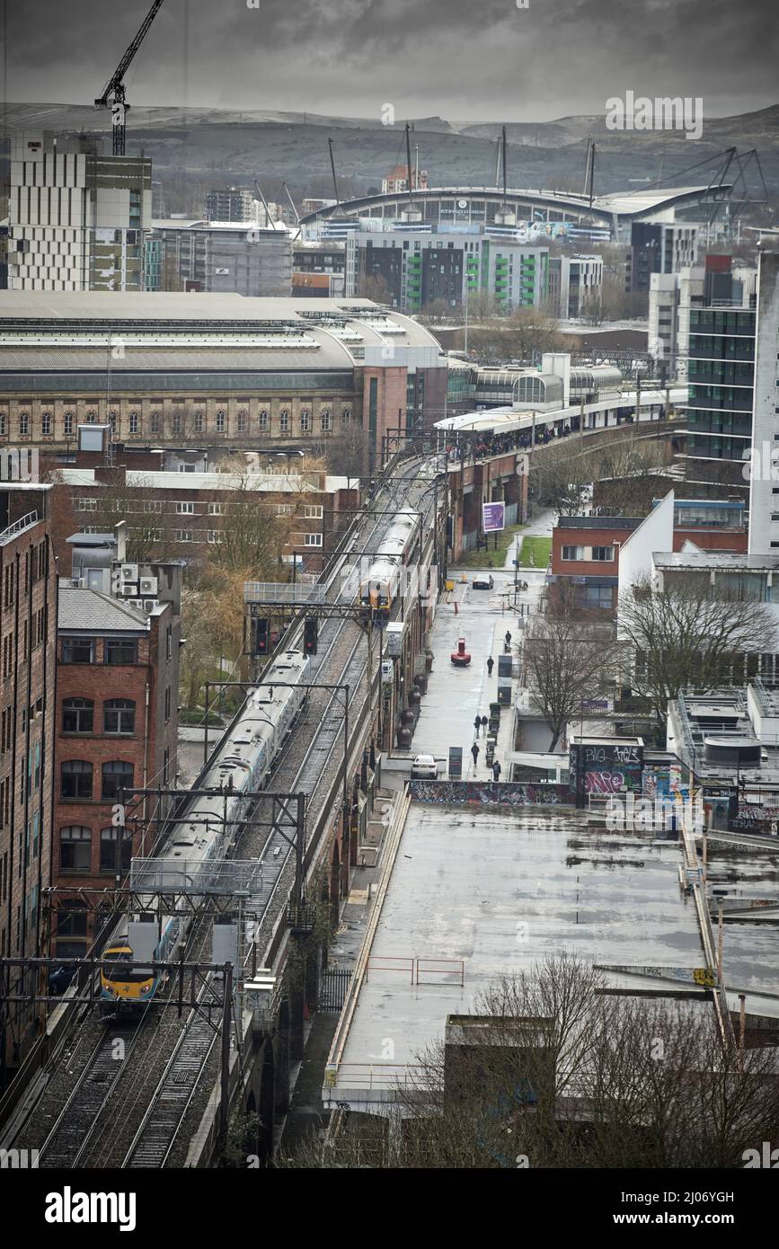Trains at Manchester Piccadilly platforms 13 14, with Manchester City ...