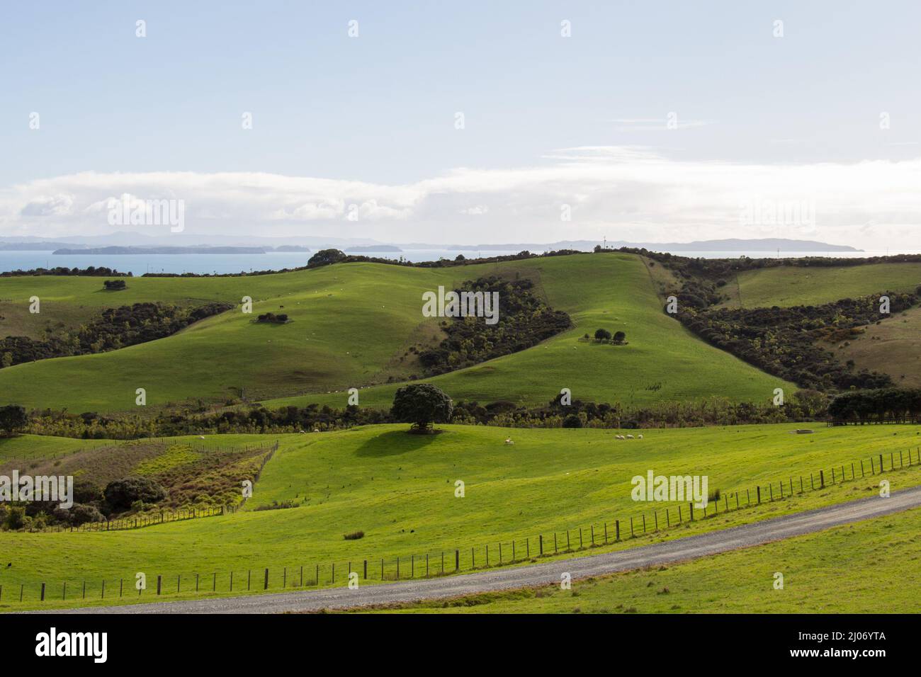 The veiw of picturesque landscape with green grass hills and blue sea ...
