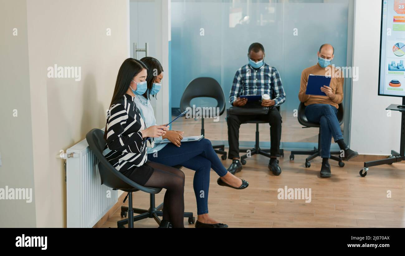 Office worker inviting candidate to enter job interview meeting ...