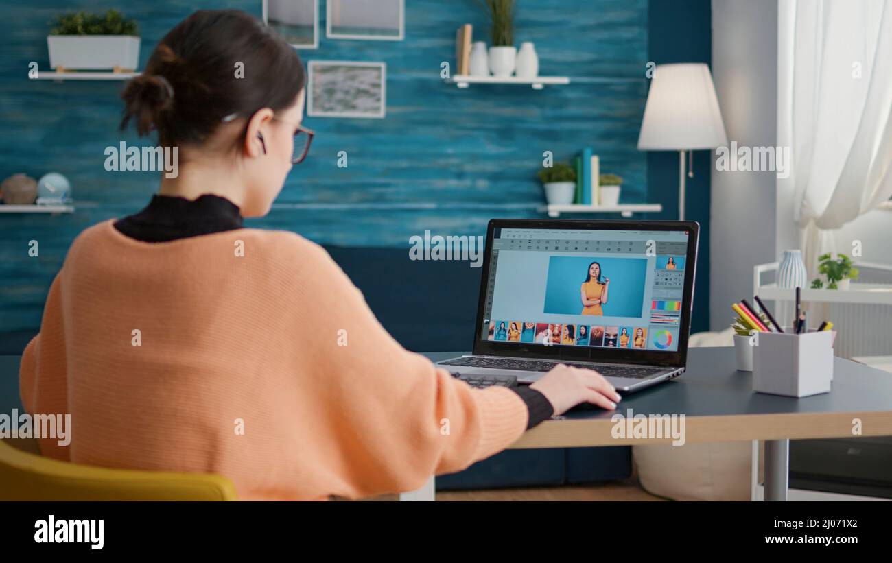 Photography student using retouching hi-res stock photography and ...