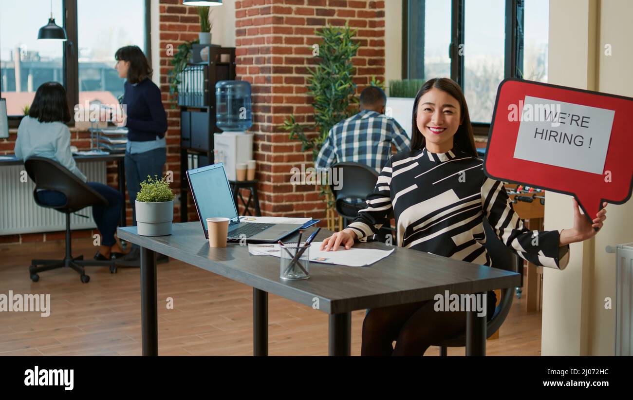 Portrait of HR employee holding speech bubble to advertise job offer ...