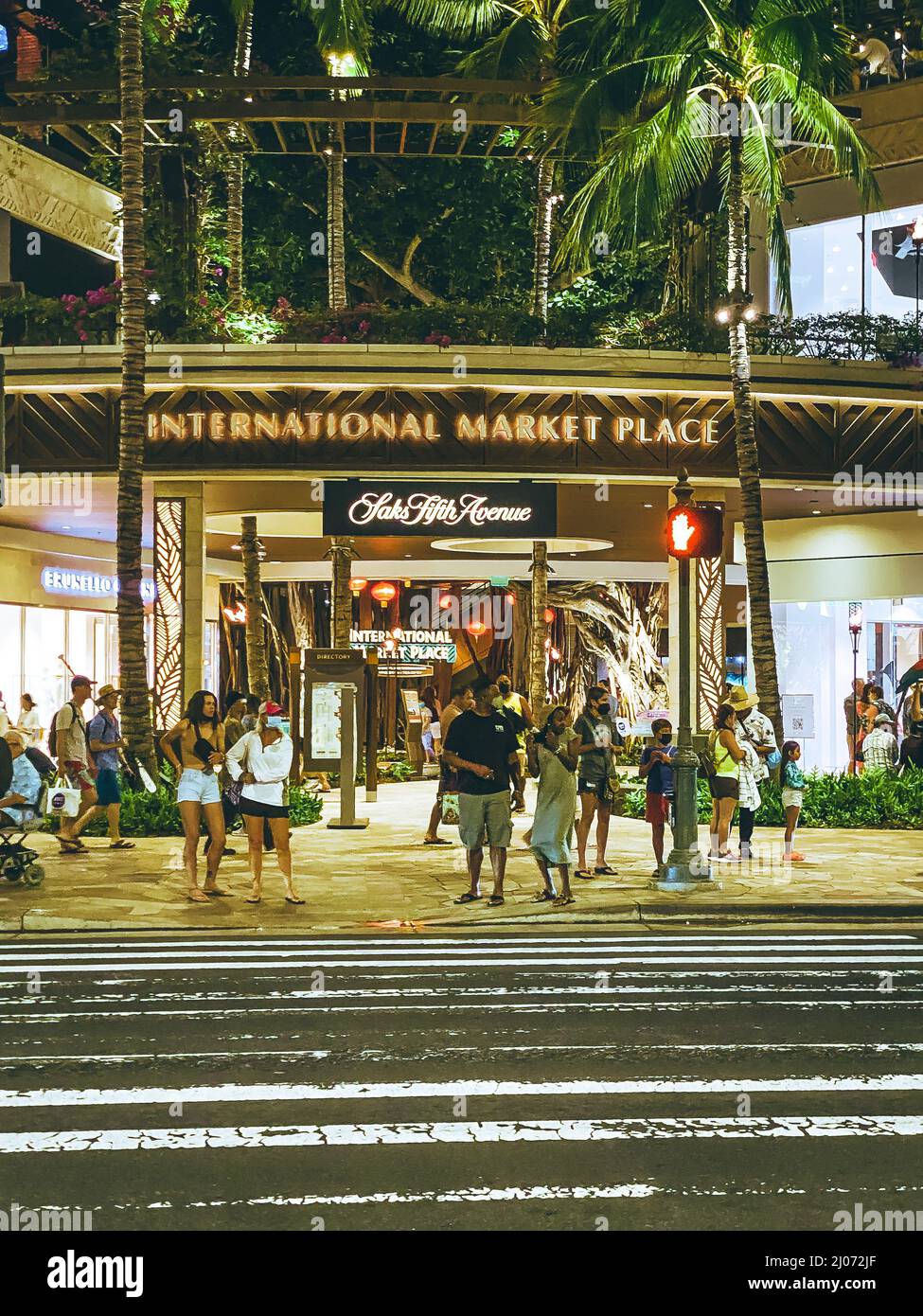 People against a crosswalk in front of International Market Place in ...