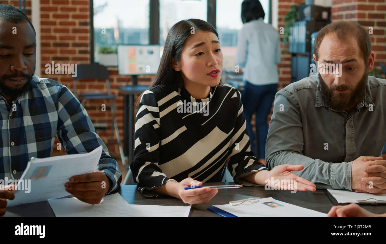 Displeased worker getting fired multiethnic hi-res stock photography ...