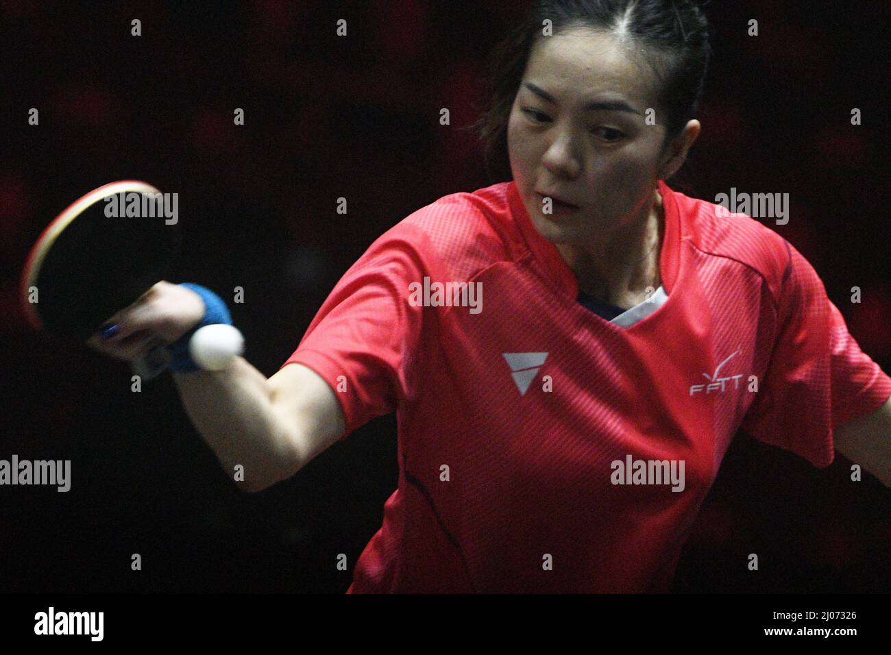Singapore. 17th Mar, 2022. Yuan Jia Nan of France hits a return during ...