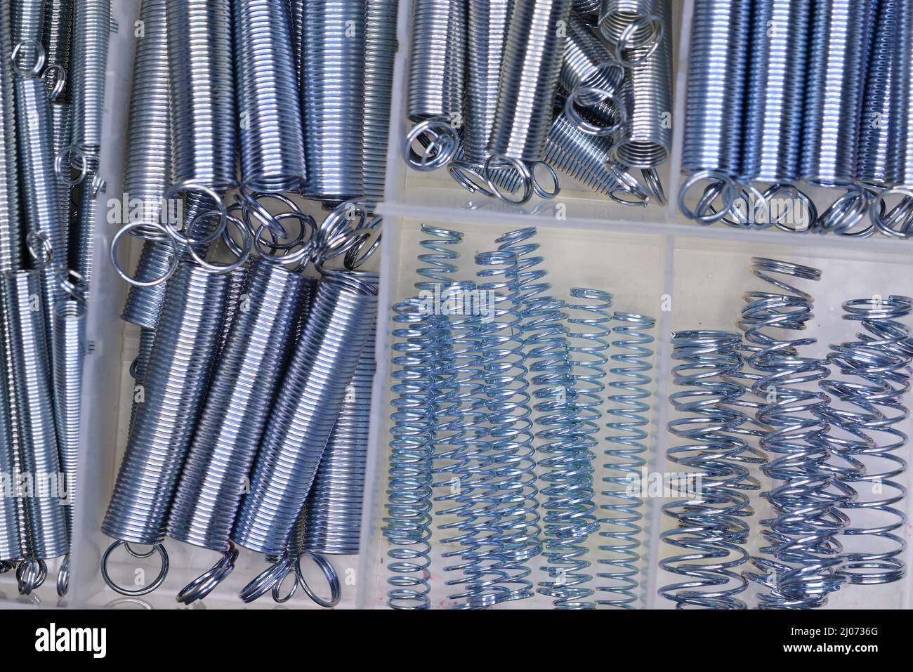 Springs of different sizes hi-res stock photography and images - Alamy