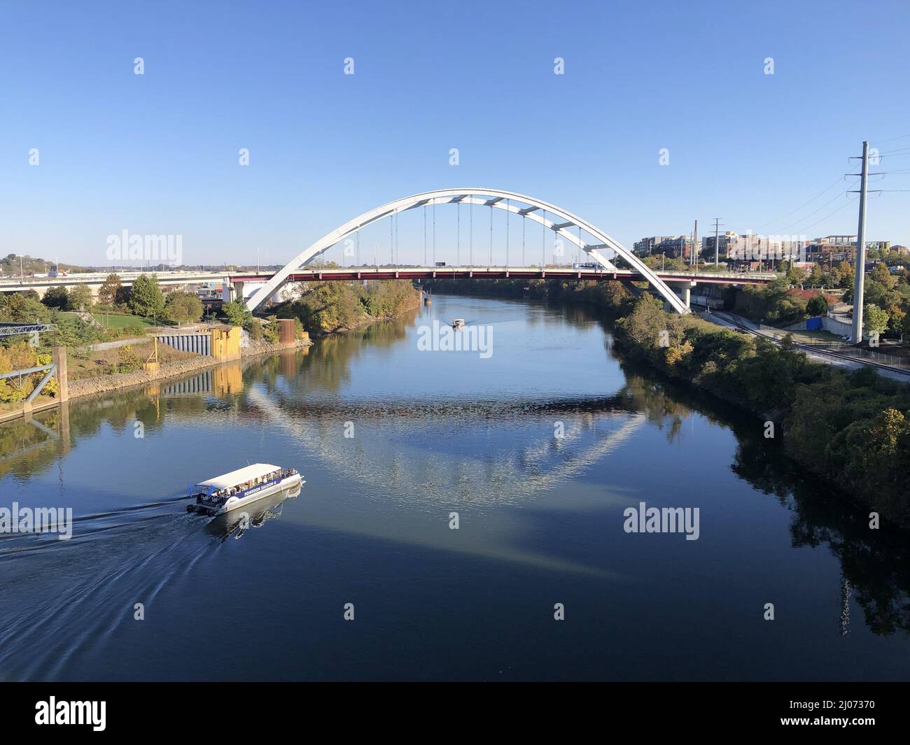 Nashville Riverfront bridge reflection blue sky Stock Photo - Alamy