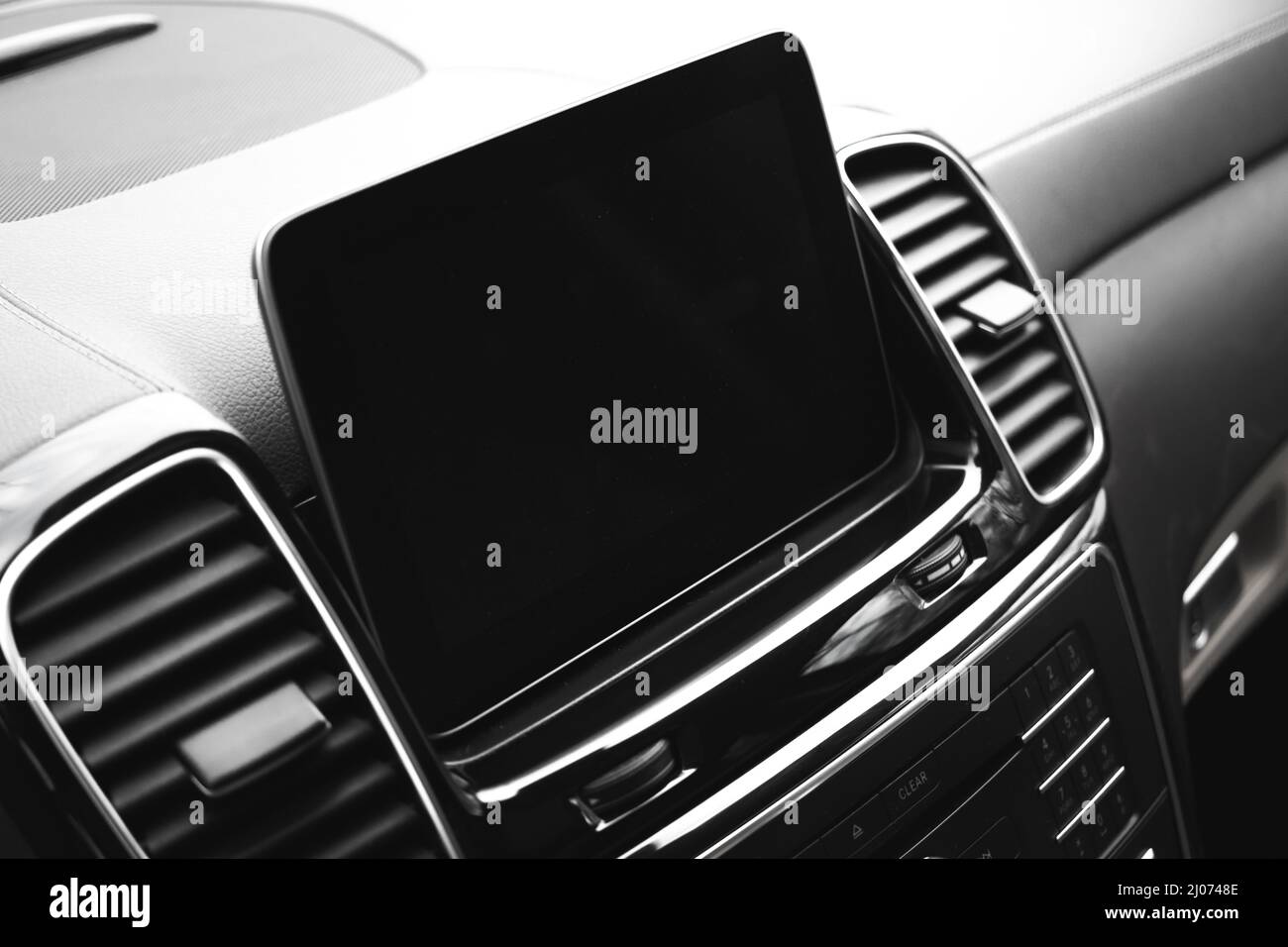 Modern car dashboard with multimedia screen. Interior detail, luxury ...