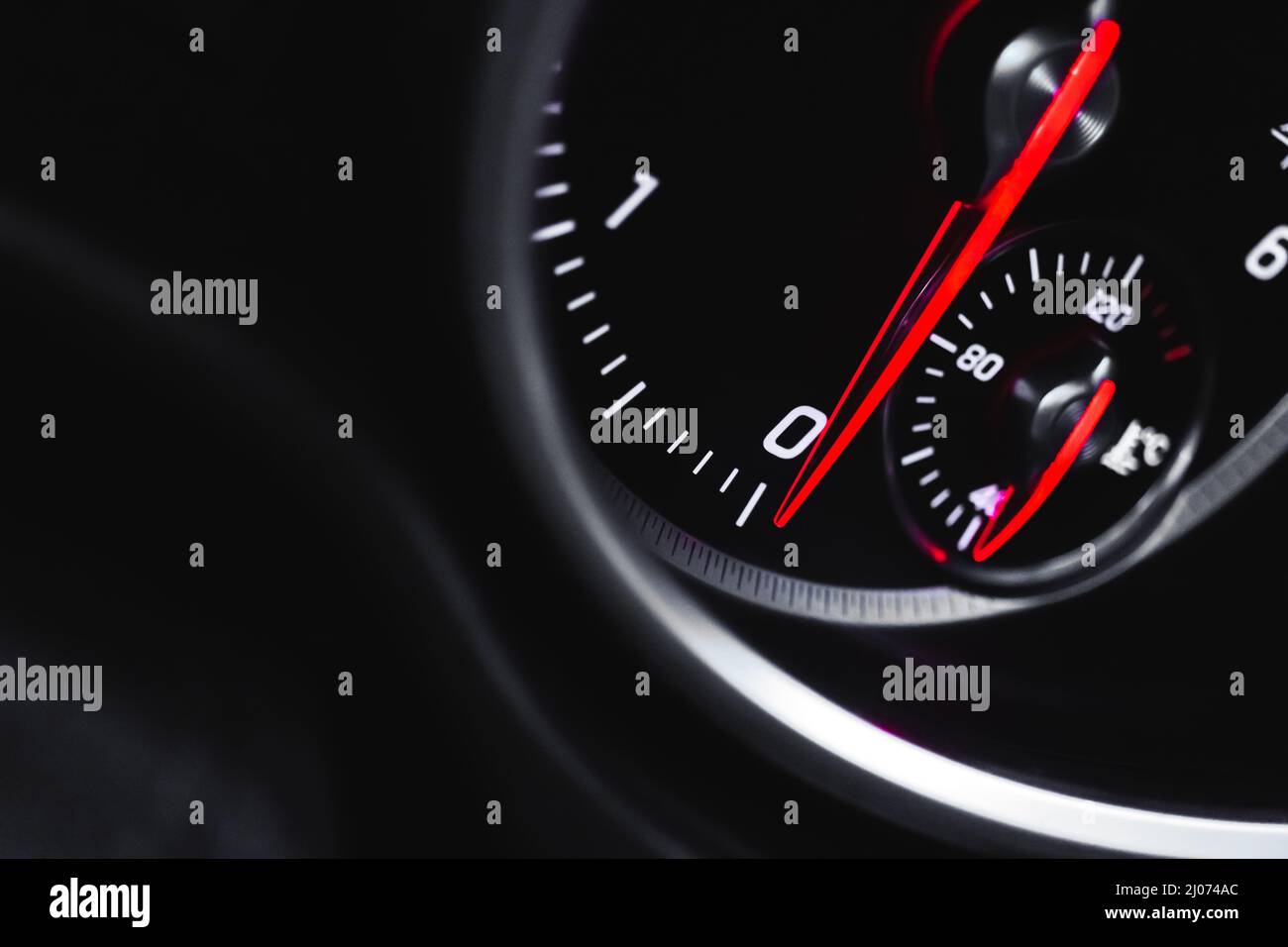 Car tachometer with glowing red indicators closeup view, of luxury ...