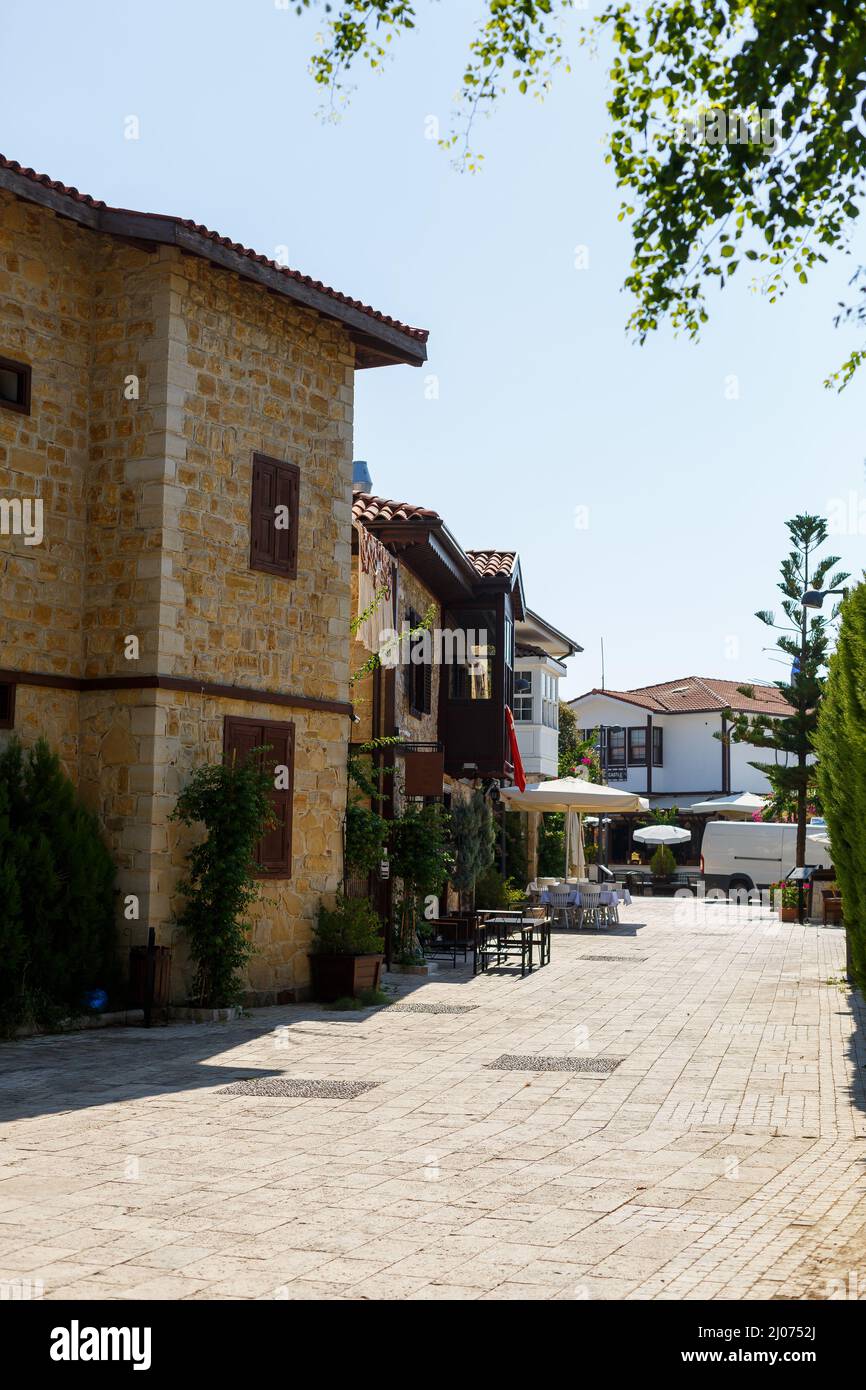 Traditional Greek old street with houses and paving stones Stock Photo ...