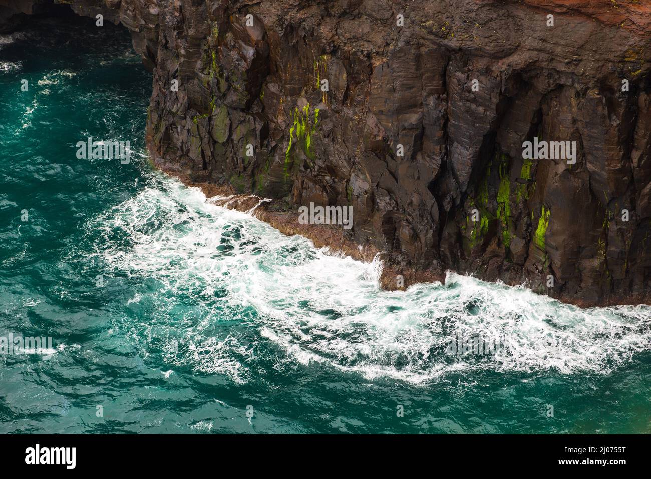 View of the steep Atlantic Ocean coast on Vagar Island near Gasadalur ...