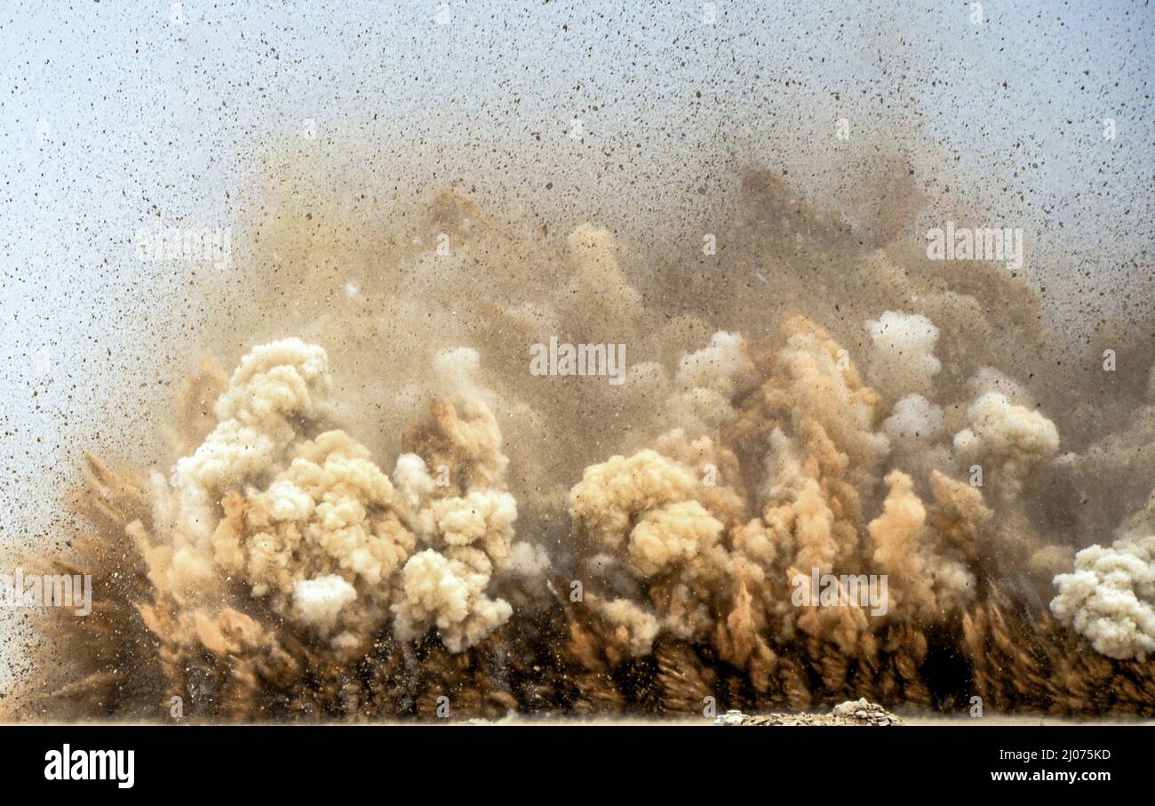 Dust storm during powerful detonator blast on the mining site in the ...