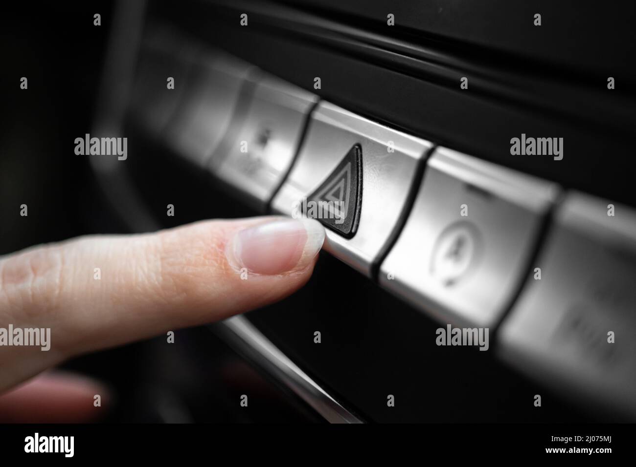 Car emergency light button, triangle car warning button in luxury sport ...