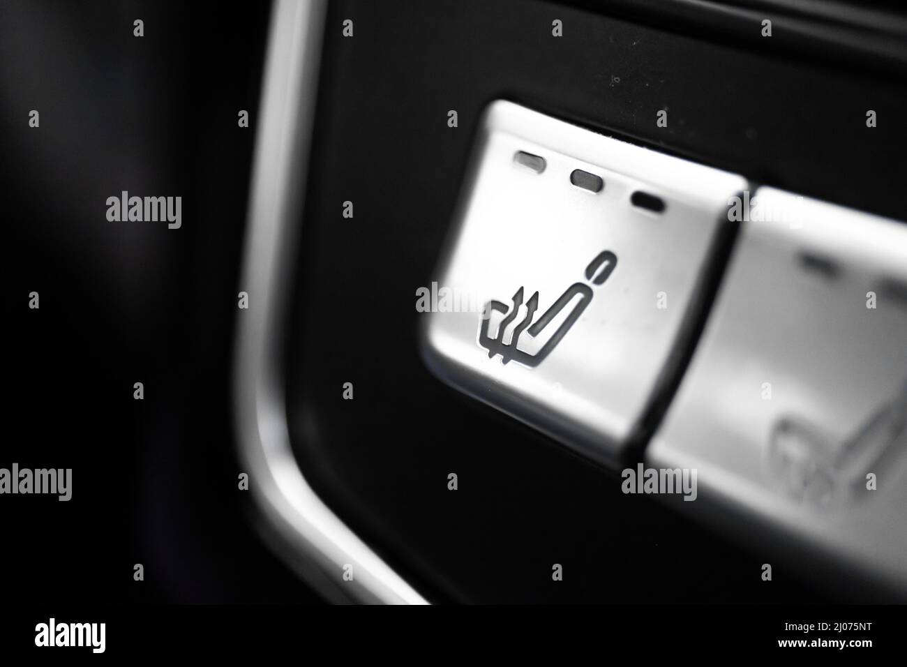 Heated seats buttons inside car. Seat heating buttons control panel in ...