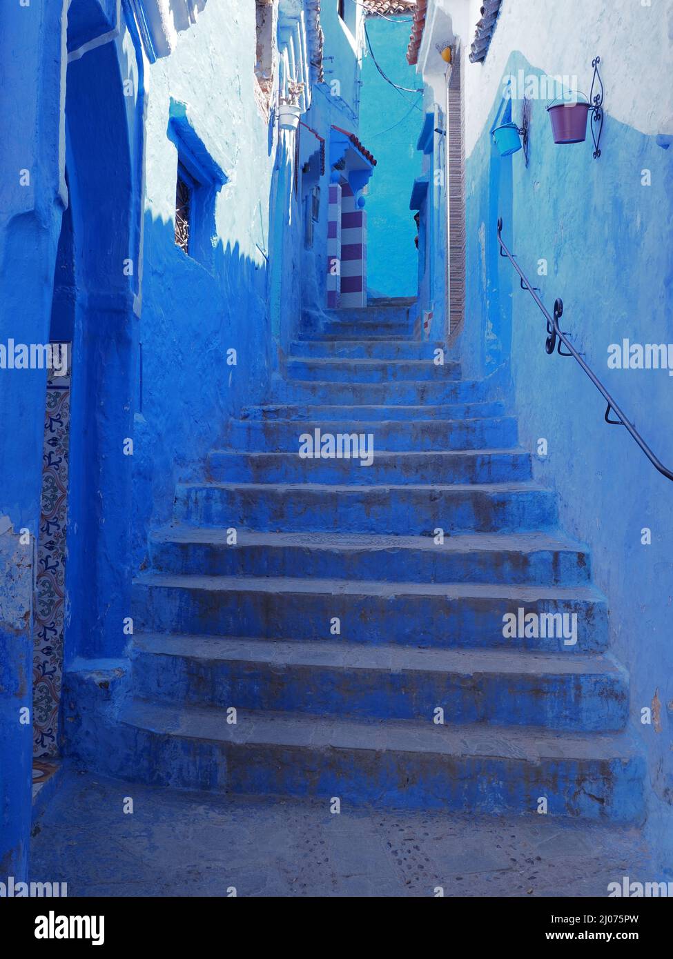 Blue stairs at moroccan alley in african Chefchaouen city in Morocco in ...