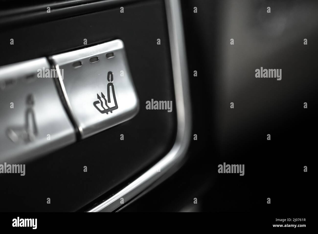 Heated seats buttons inside car. Seat heating buttons control panel in ...