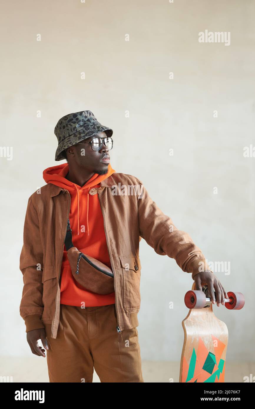 Vertical medium studio shot portrait of young African American student ...