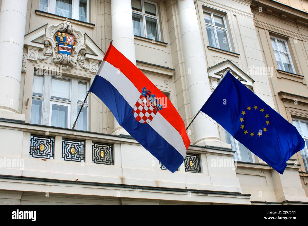 Flags of Croatia and European Union against the facade of Croati Stock ...
