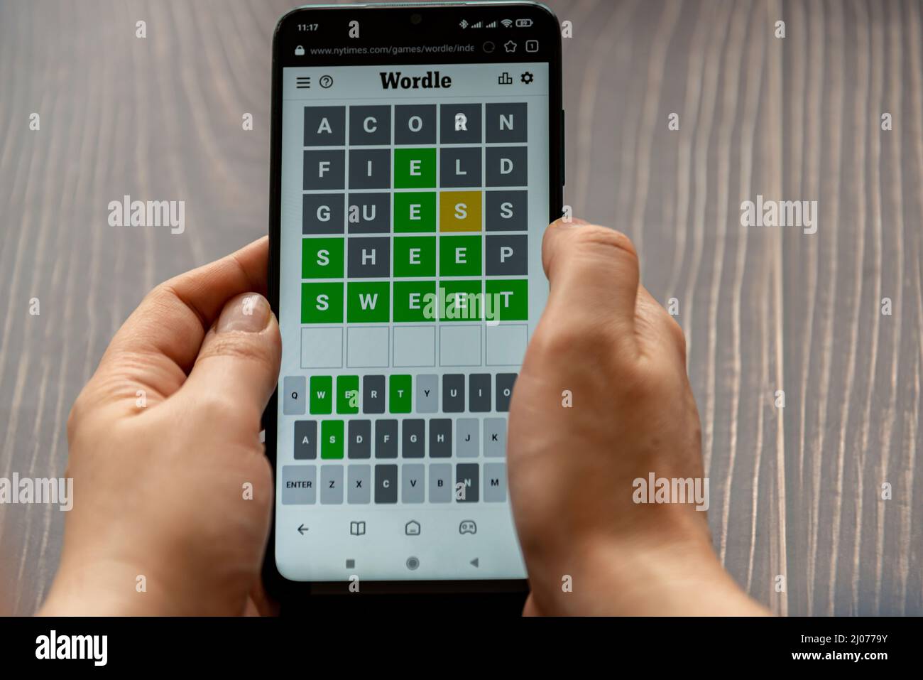 Playing wordle game hi-res stock photography and images - Alamy