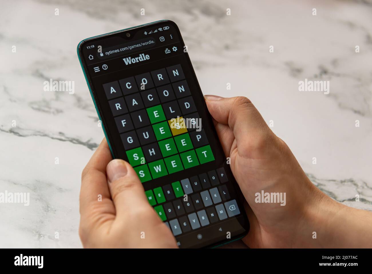 Playing wordle game hi-res stock photography and images - Alamy