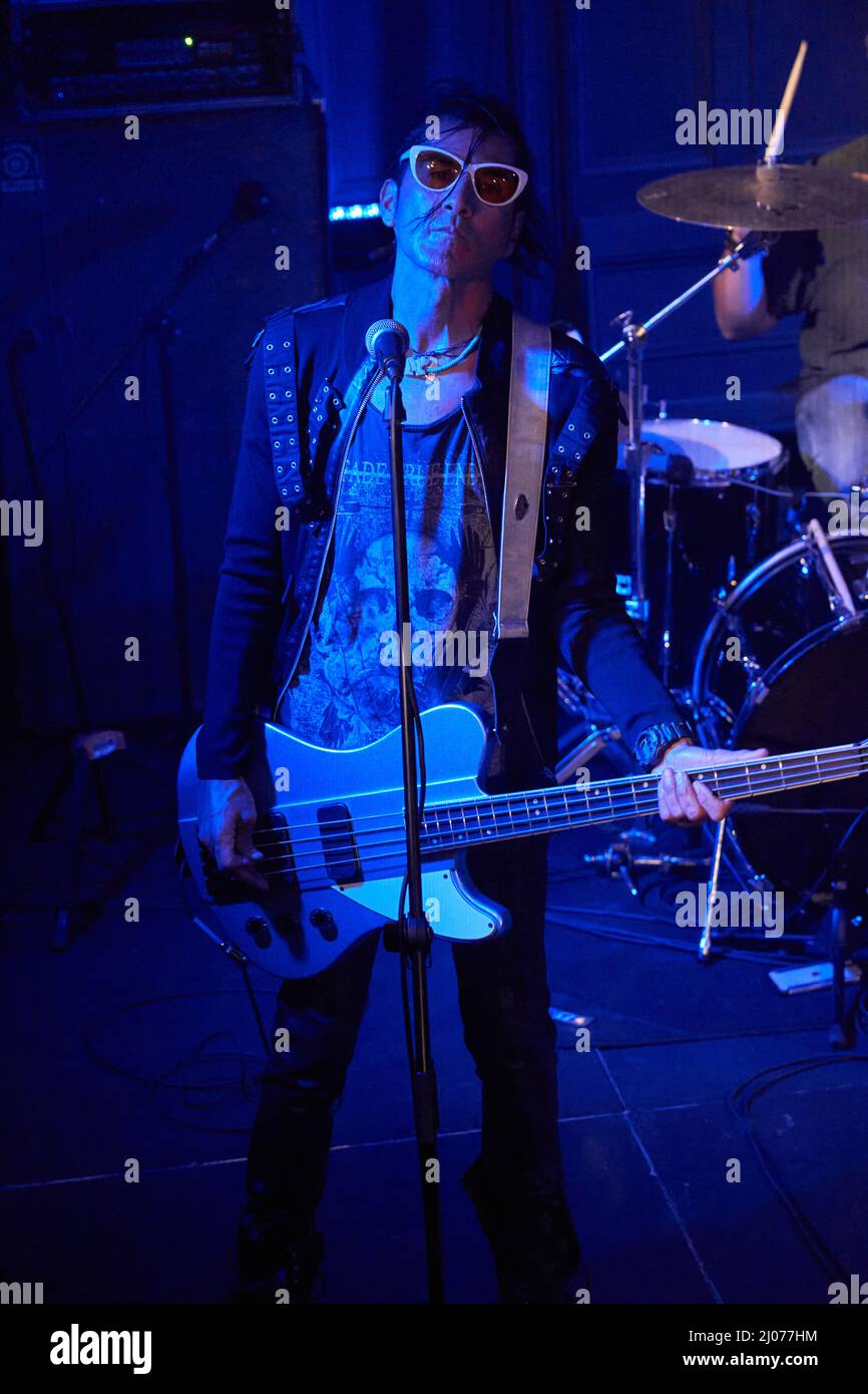 Bassist Pando performing with eighties New Wave band A Flock of ...
