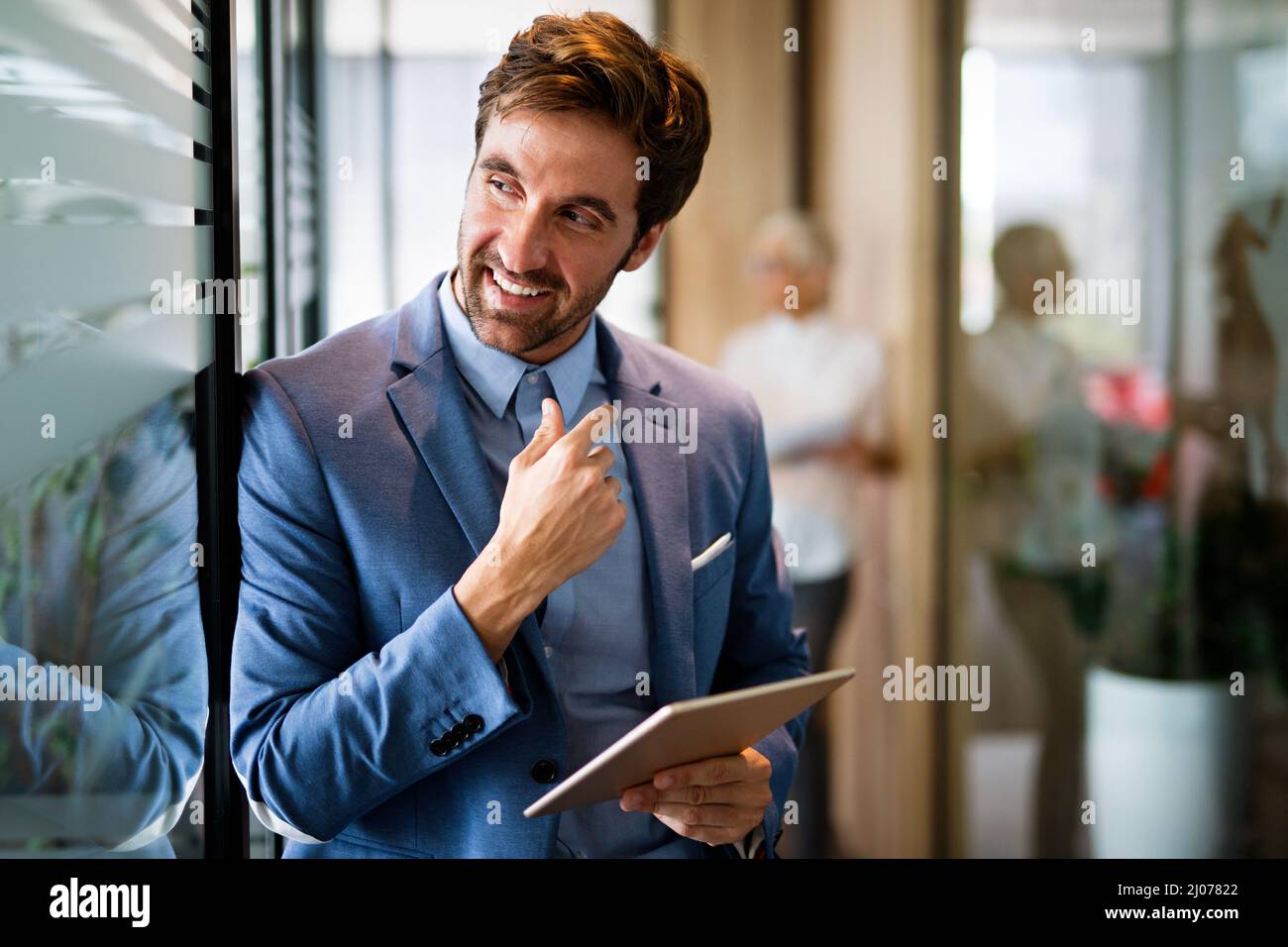 Friendly successful male manager hi-res stock photography and images ...