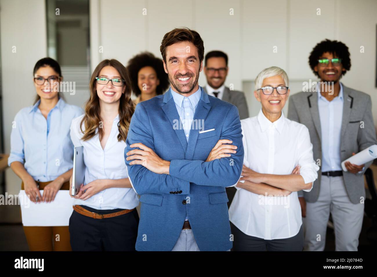 Success group of entrepreneurs and business people achieve goals ...