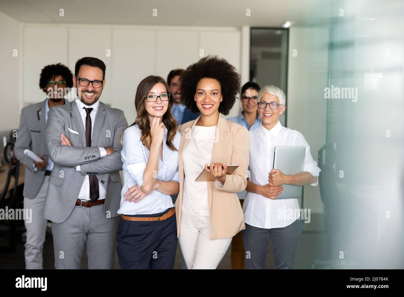 Happy group of business team celebrating a good job in the office ...