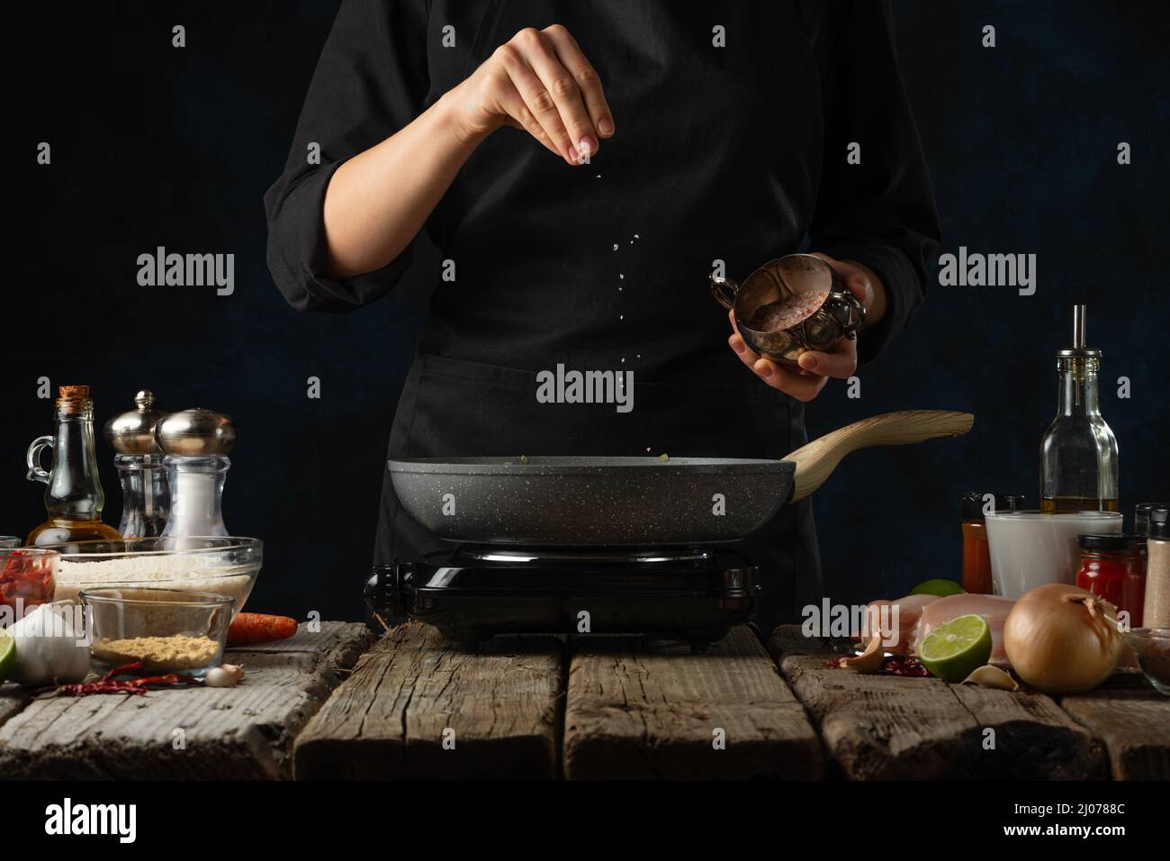 Chef pours sea salt hi-res stock photography and images - Alamy