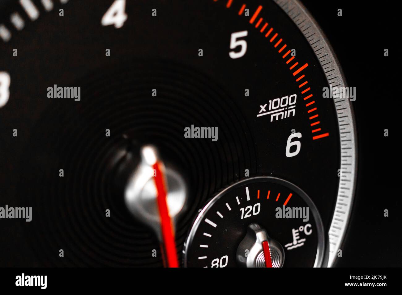 Car tachometer with glowing red indicators closeup view, of luxury ...