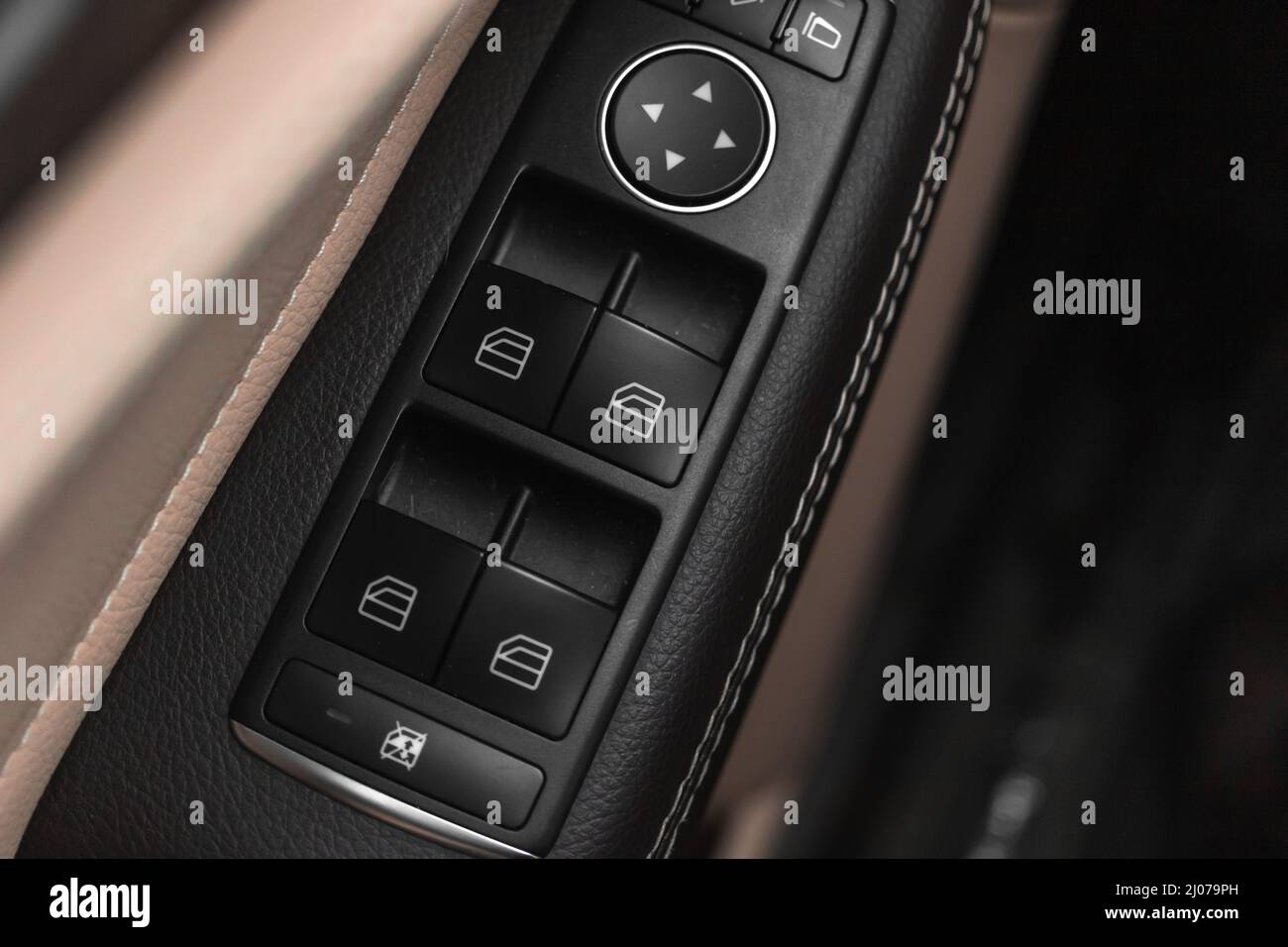 Window buttons inside luxury car. Automatic power controlling system ...