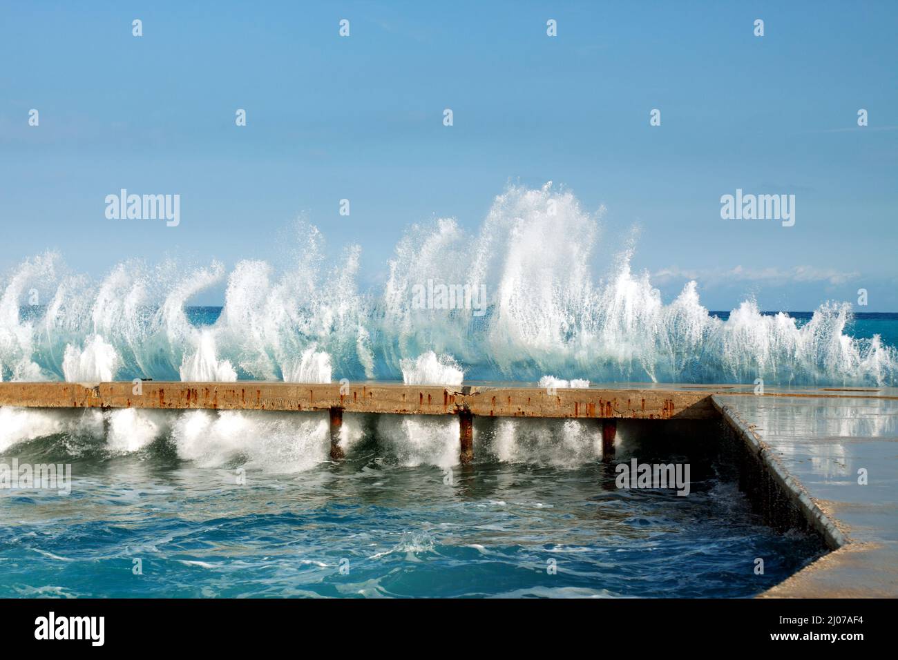 Waves crashing barrier hi-res stock photography and images - Alamy