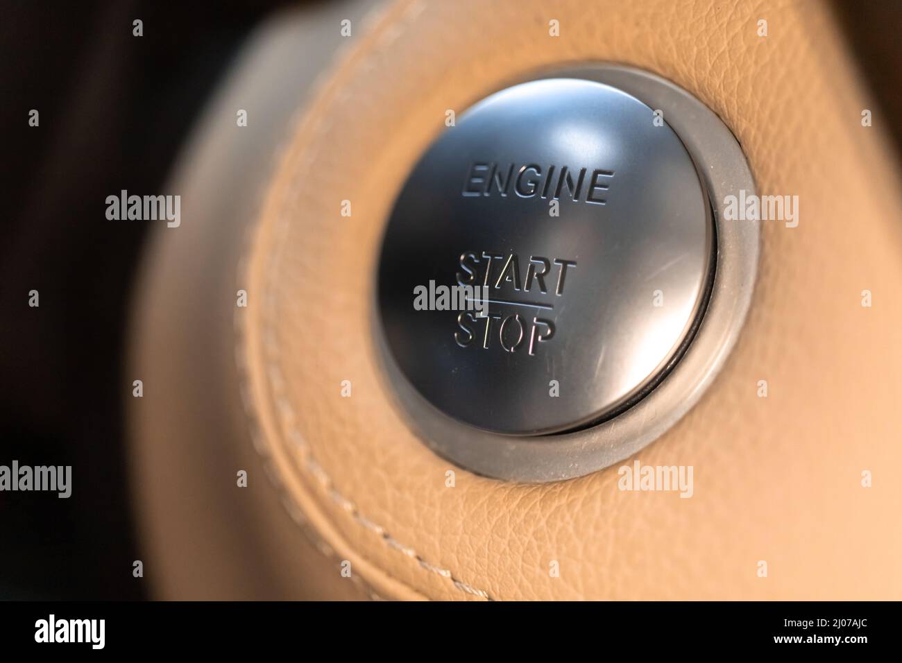 Engine start and stop button in luxury sport car close-up view photo ...