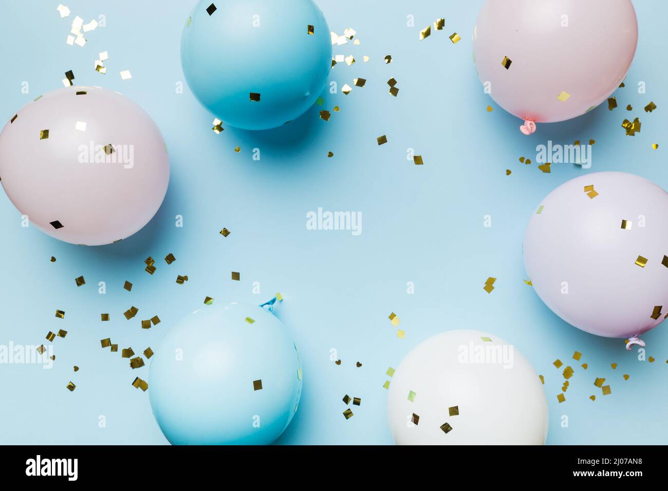 Flat lay party decoration concept on pastel colored background from ...