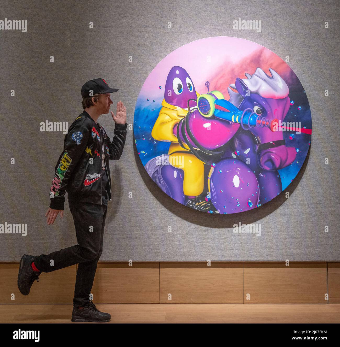 Bonhams, London, UK. 17 March 2022. The artist Philip Colbert unveils ...