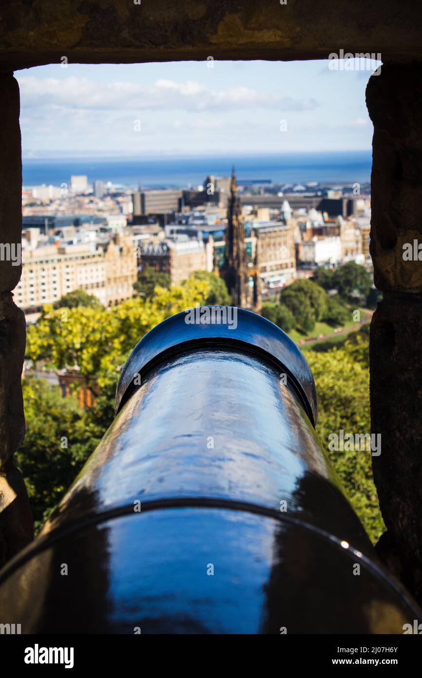 Vertical shot of a historic cannon on a battlement remained as ...