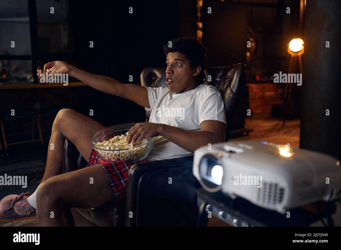 Angry man watching tv on hi-res stock photography and images - Alamy